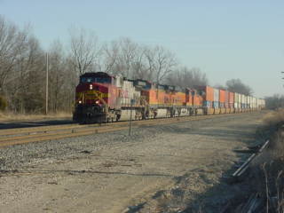 BNSF 746 West leading a stack train.
