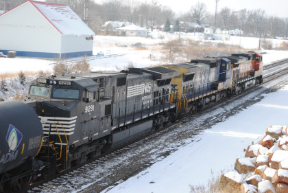 Here came a colorful BNSF westbound train with BNSF 4369, CSX 7644 and Norfolk Southern 9291.