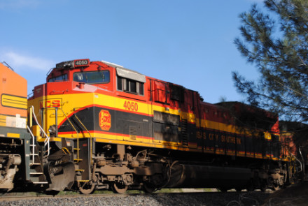 BNSF 5361 East with Kansas City Southern 4050 climbed up the grade at Woodford.