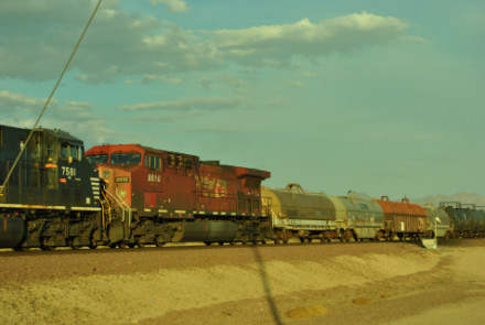 BNSF 7128 West with Norfolk Southern 7581 and Canadian Pacific 9510 at MP 672.