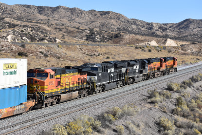 BNSF 8035 East with Norfolk Southern SD70M-2 2764 and Norfolk Southern ET44AC 3653 in its consist.