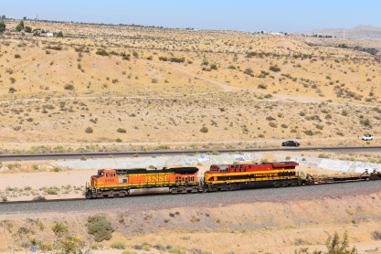 BNSF 5459 West with KCS ES44AC 4872 in its consist at Frost.