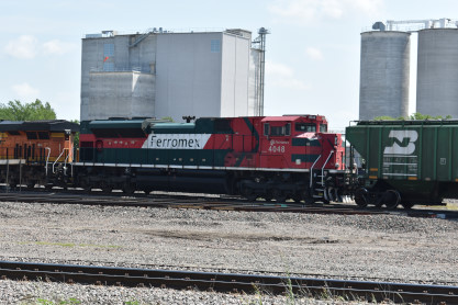 BNSF 6539 with Ferromex SD70ACe 4048 heading into grain siding.