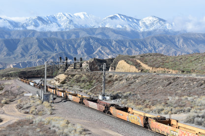 BNSF 7917 East with ES44DC 7917 and C44-9W 5097 on a baretable train.