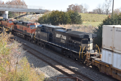 BNSF 6158 East with Norfolk Southern AC44C6M 4375 in the motive power consist.