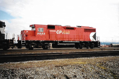 CPR GP38-2 3033 in its multi-mark livery on St. Patrick's Day 1997.