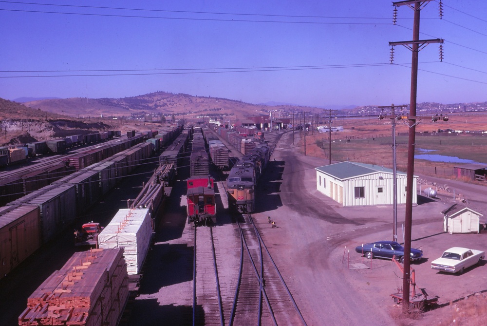 An overview of the yard finds a set of mostly former SP&S power switching in the yard.
