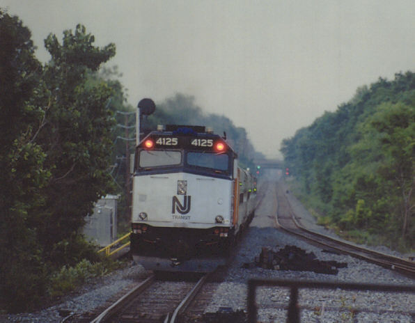 NJT F40PH-2CAT 4125 leaves Union Station with aneastbound train.