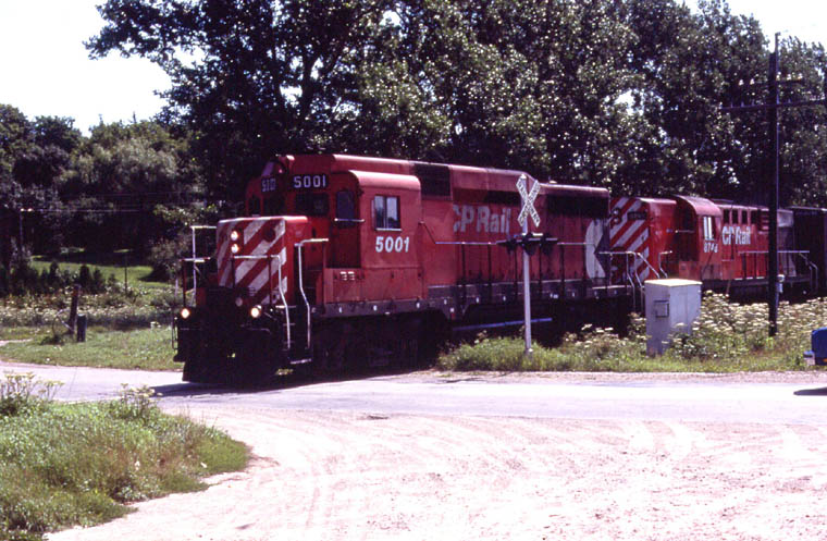 5001, (GMD A2007 3/63) one of only two CPR GP30's leads RS-18 8748 northbound at Markdale ...