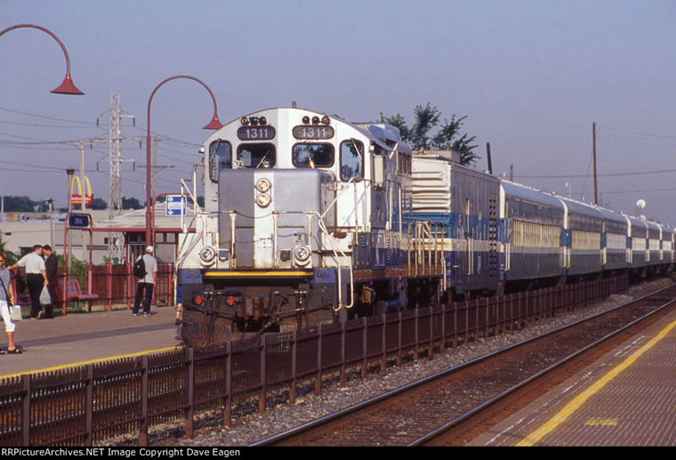 1311 (acq. 3/1990) ex CN 4307 GMD GP9 A1664 3/1959 Dorval 7/20/2001 Dave Eagen