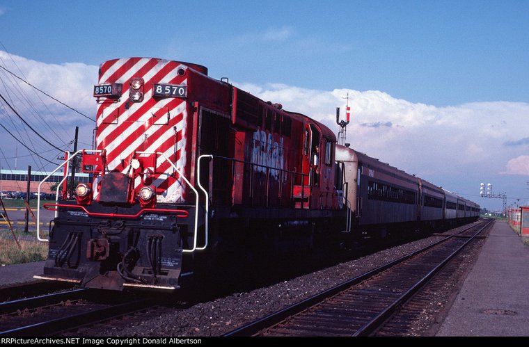 CP 8570 RS-10s "borrowed" power for westbound at Dorval. 7/15/1983