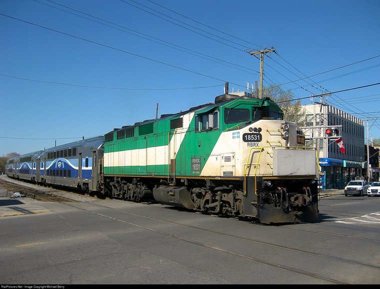 RBRX 18531 pushes a train westbound over the Westminster Avenue crossing at the end of the ...