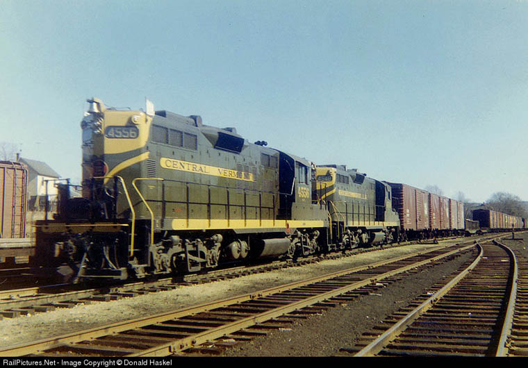 CV 451 running Extra 4556 and 4548 GP9's EMD 3/1957 at Palmer, Massachusetts. July 1961.