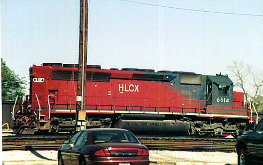 Soo SD50 no. 6056 and another Soo SD50 lead a CSXT freight south (timetable east) toward ...