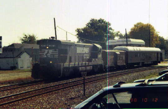 B23-7 no. 3973 is the sole power for the NS Track Geometry Train , and is seen approaching the ...
