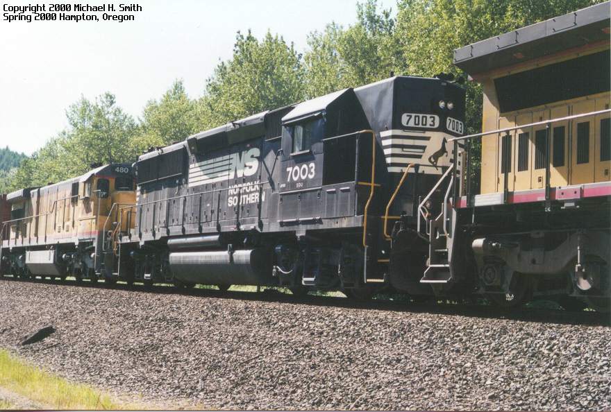 Norfolk Southern GP50 #7003 is sporting a high nose as she helps pulla southbound UP manifest up ...