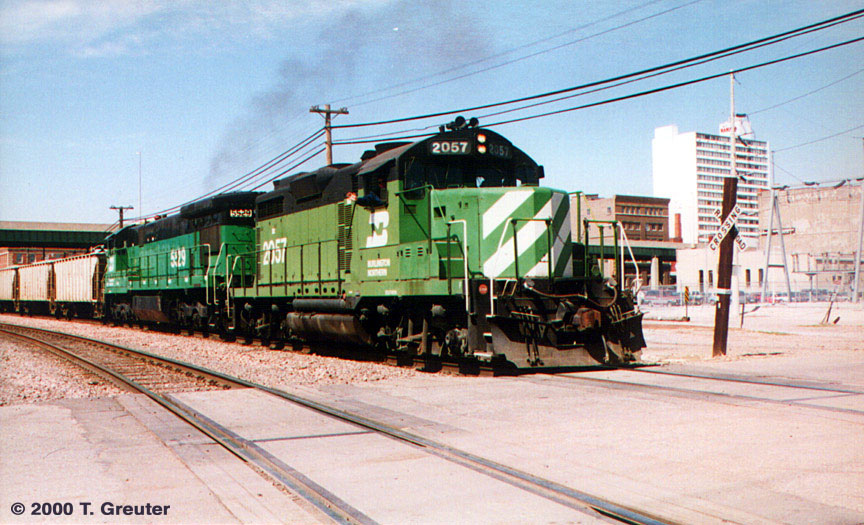 BN 2057 - a GP20, leads #5529, a C30-7 out of BN's Lincoln Station yard for Hobson Yard a mile ...