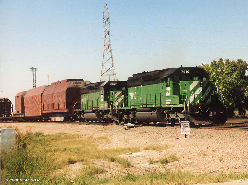 BN 7910 & 8076 - a pair of SD40-2's pull an empty aircraft parts train out of Hobson Yard; 9/10 ...