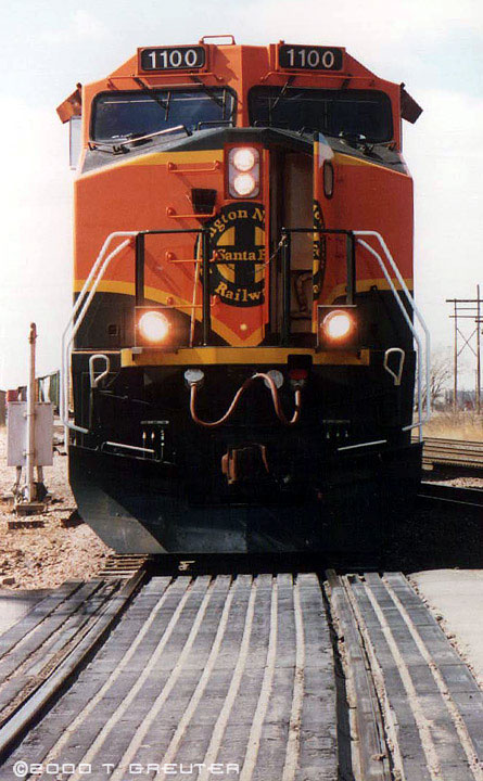 BNSF 1100 - grinds to a hault... it's been stopped due to a faulty switch ahead. - T. Greuter Photo